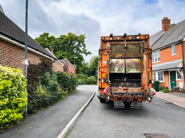 Man sleeping in bin tipped into waste truck | safety and risk management